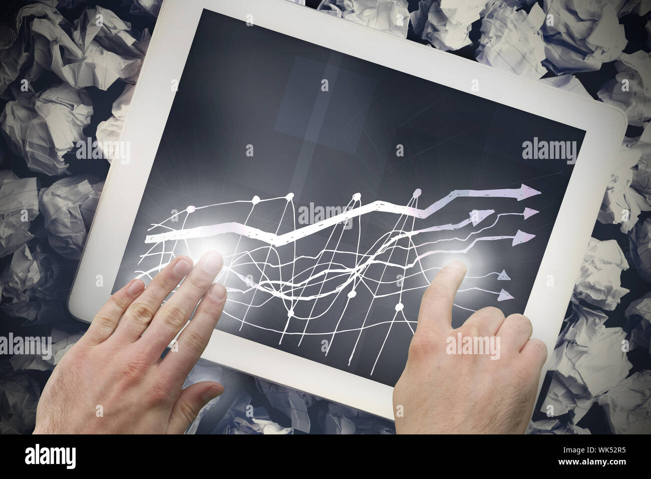 Composite image of hand touching tablet showing data analysis doodle ...