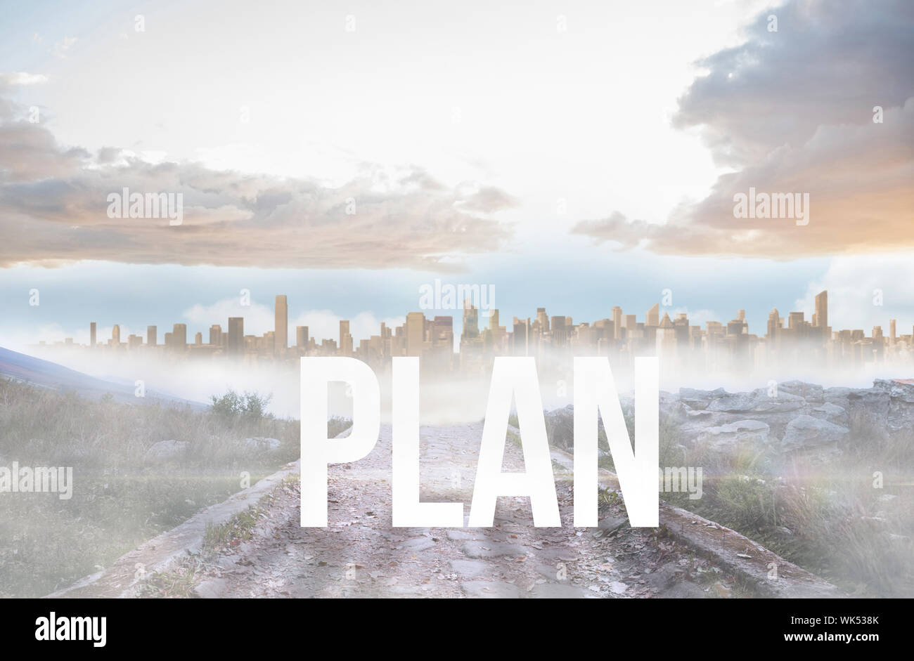 The word plan against rocky path leading to large urban sprawl Stock ...