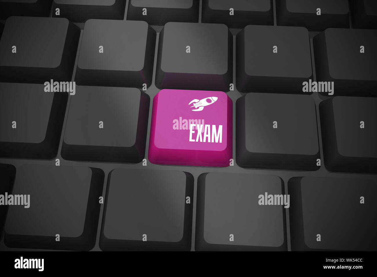The word exam and rocket ship on black keyboard with purple key Stock ...