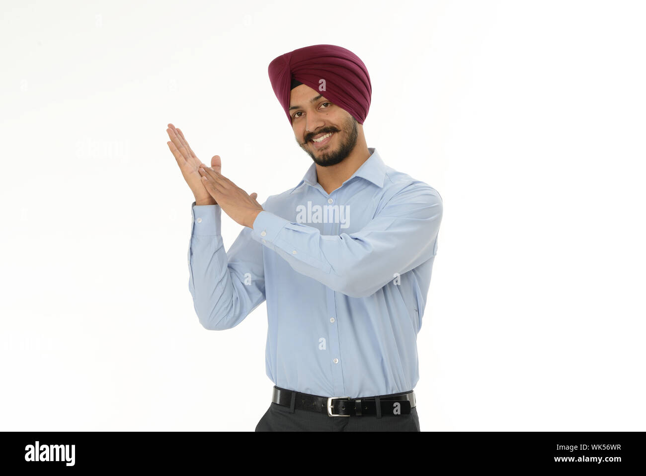 Portrait of a businessman clapping Stock Photo - Alamy
