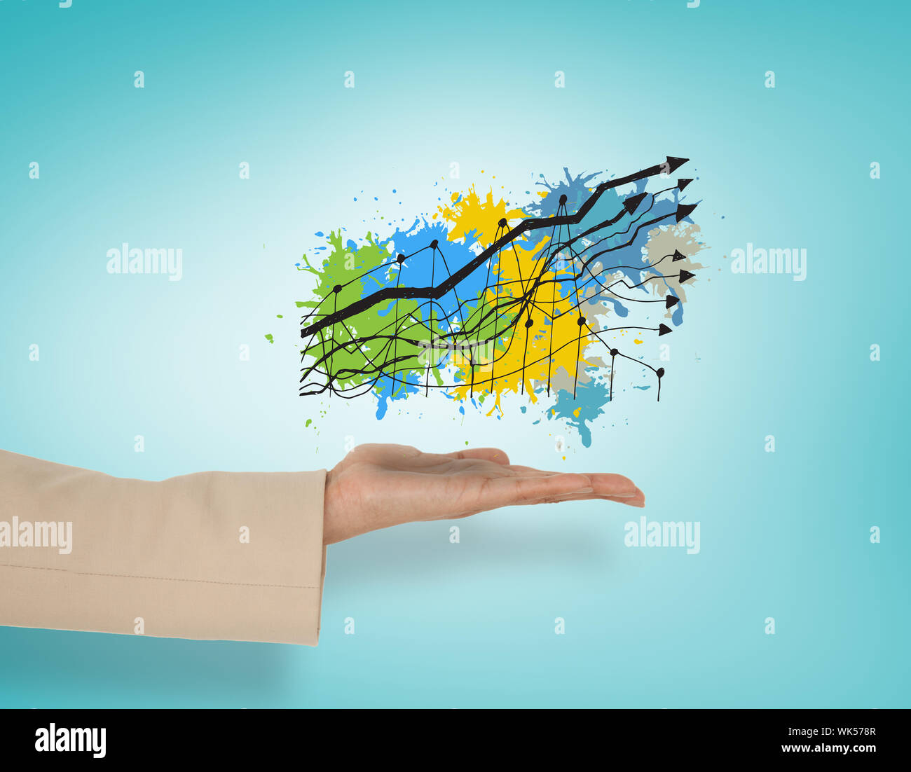 Female hand presenting graph against blue vignette Stock Photo - Alamy