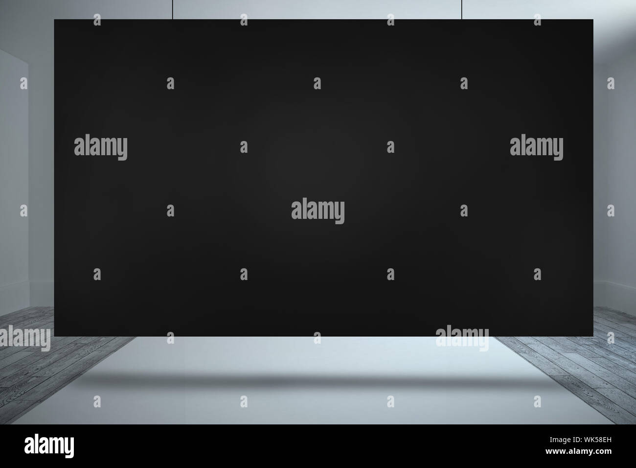 Black card against large white screen Stock Photo - Alamy