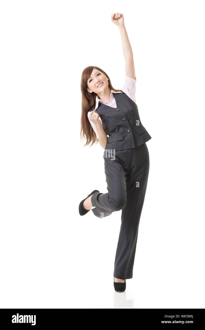 Happy business woman of Asian feel exciting, full length portrait ...
