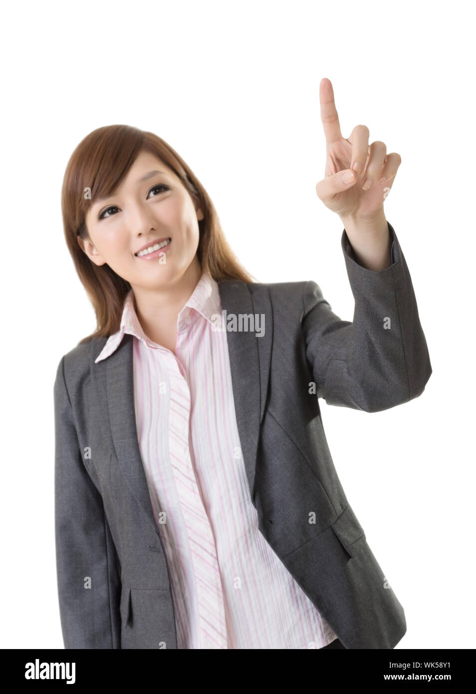 Asian business woman reach out her finger to touch button or screen ...