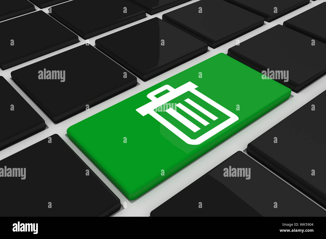 Trash can against black keyboard with green key Stock Photo - Alamy