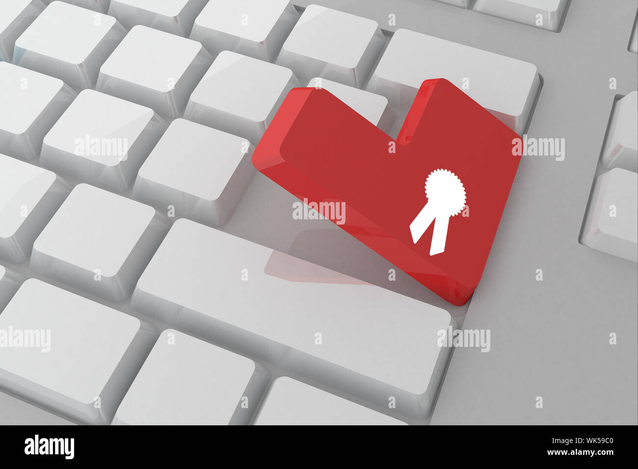 Merit badge against white keyboard with red key Stock Photo - Alamy