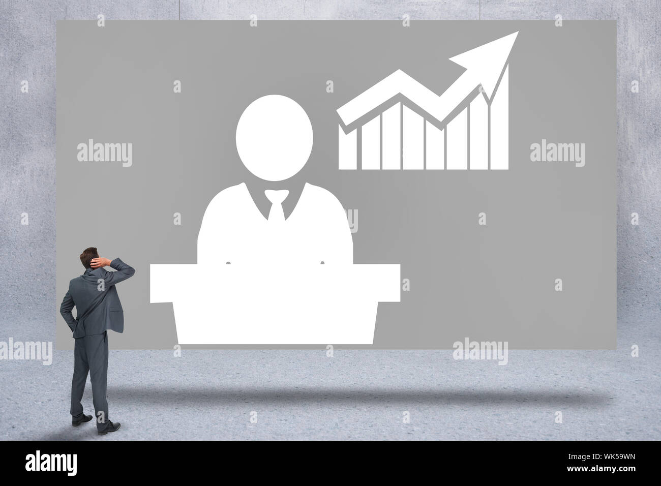 Composite image of thinking businessman against grey card Stock Photo ...