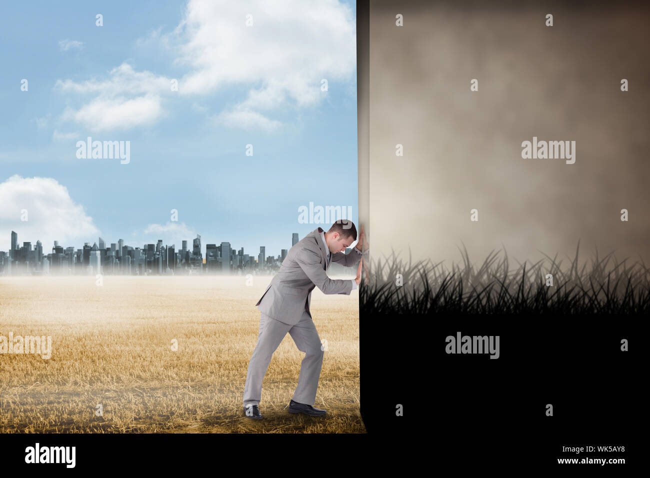 Composite image of businessman pushing away scene of dark gothic scene ...