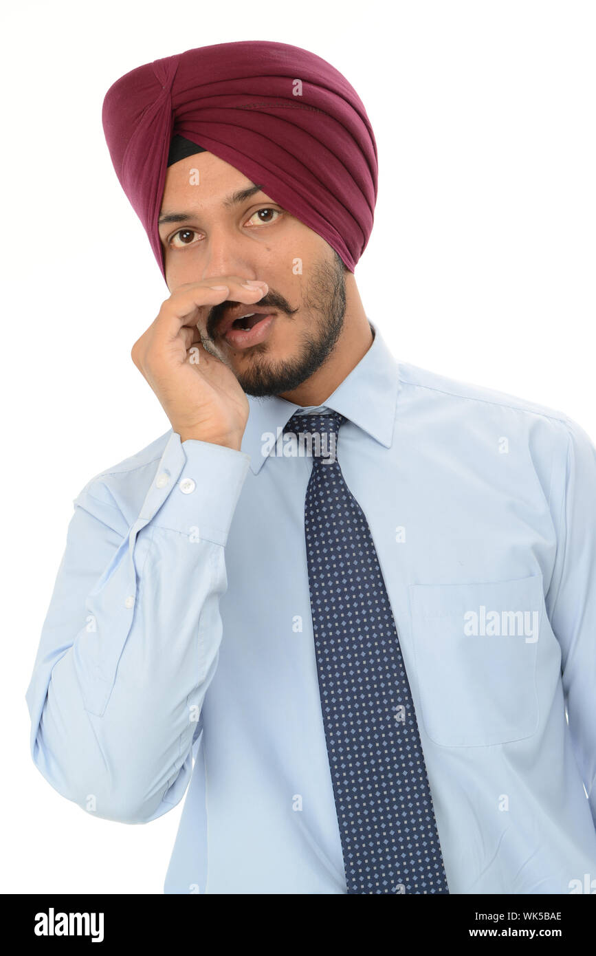 Portrait of an Indian businessman calling Stock Photo - Alamy