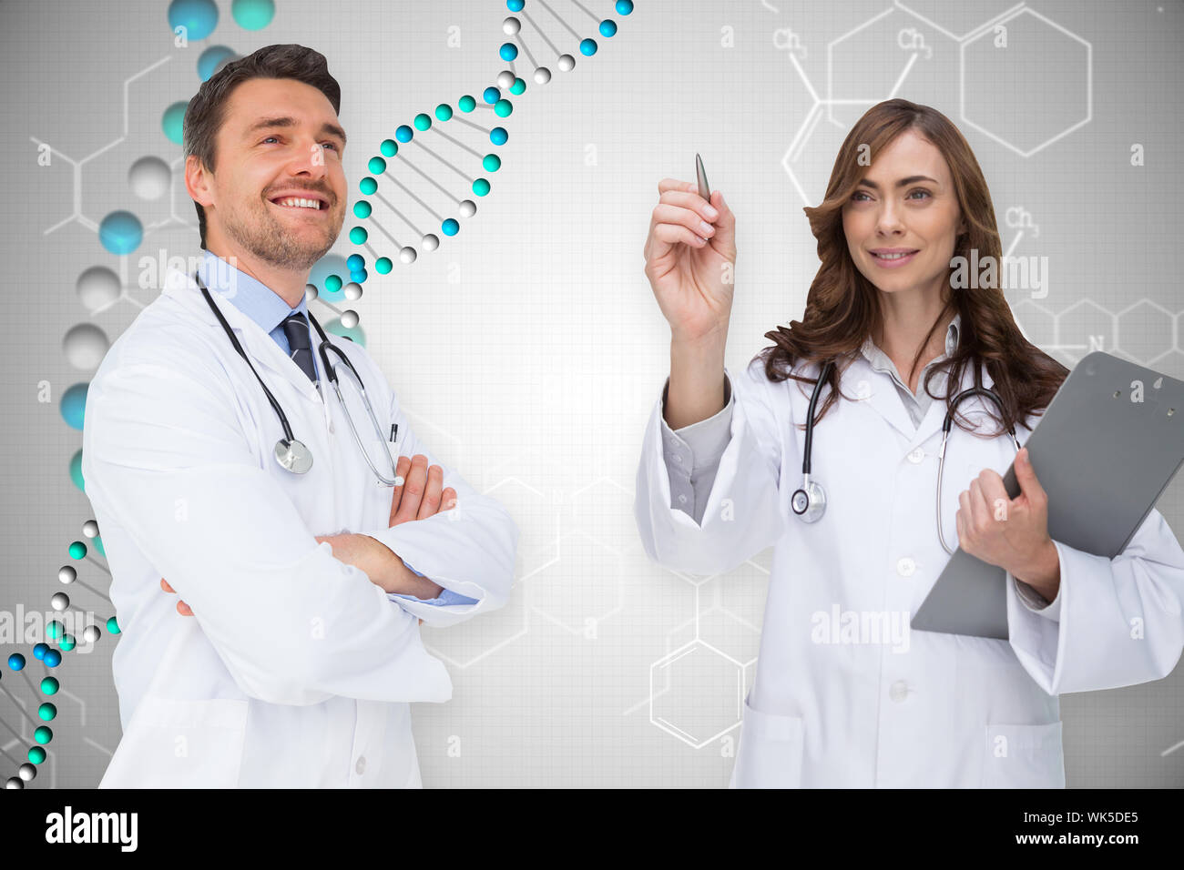Composite image of medical team against dna helix in blue with chemical ...