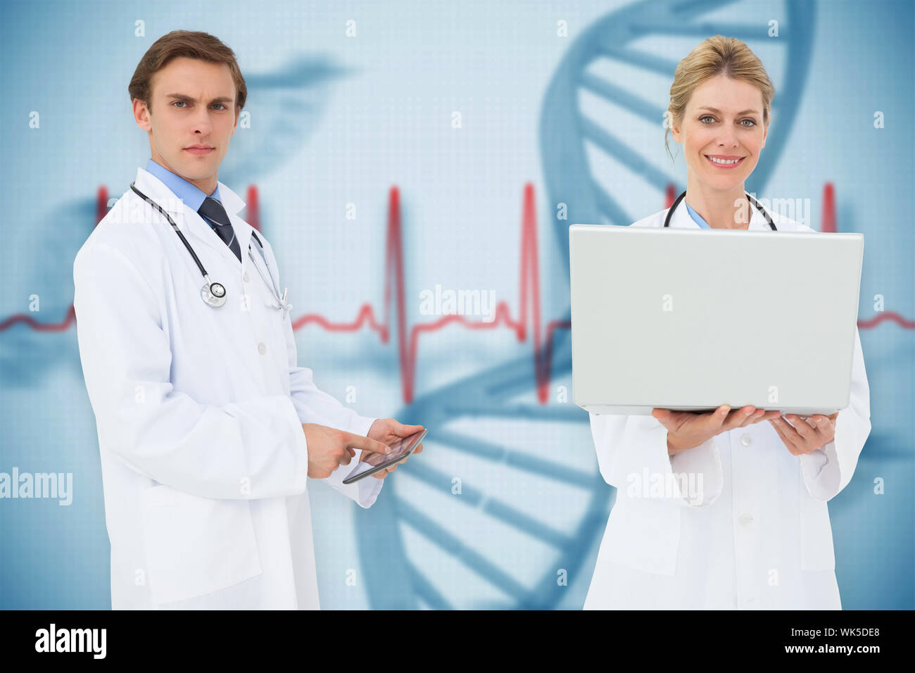 Composite image of medical team against blue medical background with ...