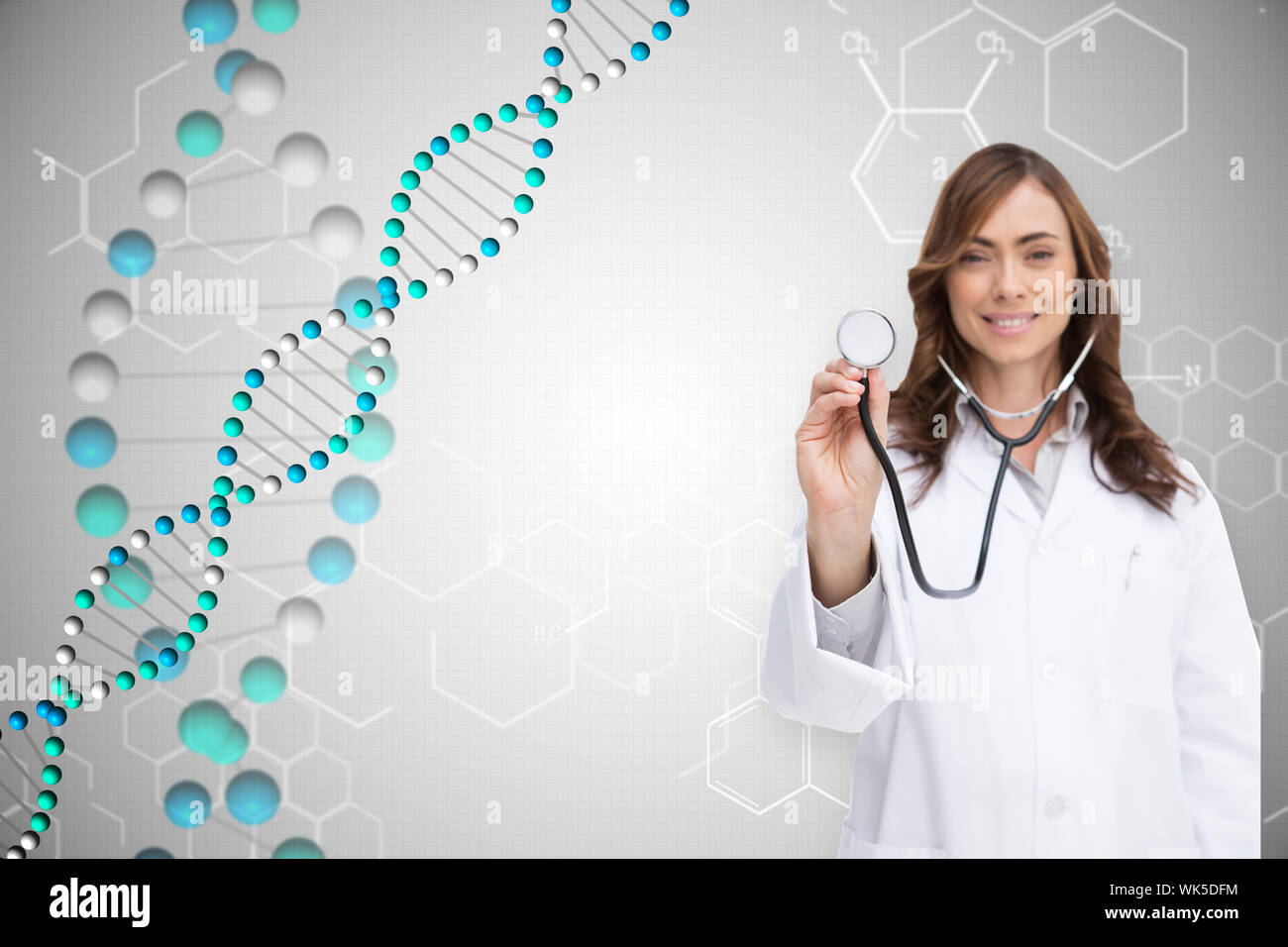 Happy doctor using stethoscope against dna helix in blue with chemical ...