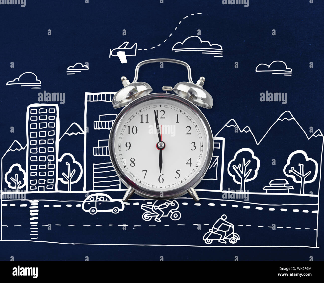 Alarm clock against navy blue with doodles Stock Photo - Alamy