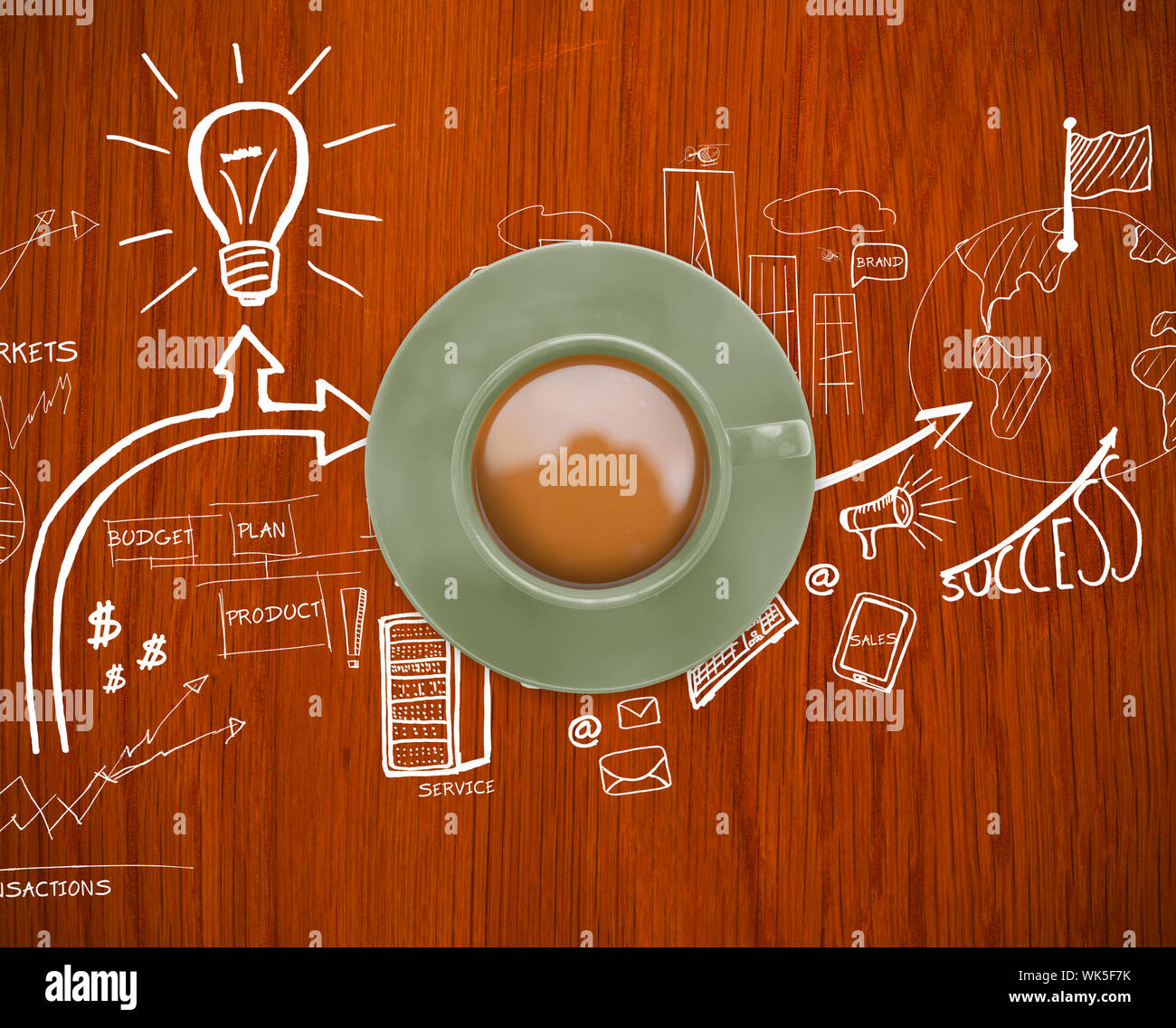 Green cup of coffee against wooden oak table with doodles Stock Photo ...