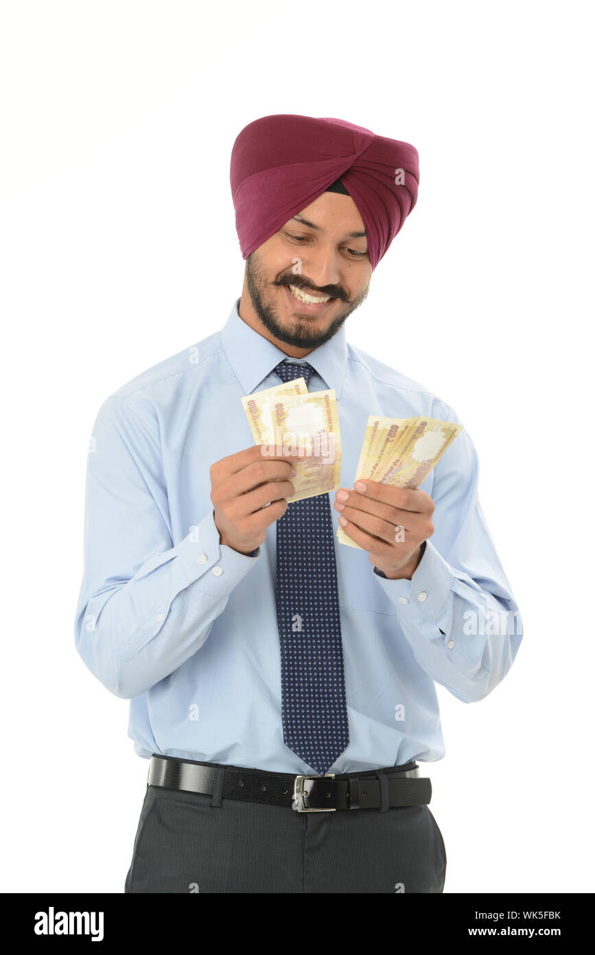 Indian businessman counting money hi-res stock photography and images ...