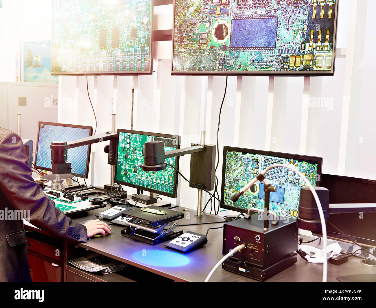 Digital microscopes with monitors from a quality control laboratory ...