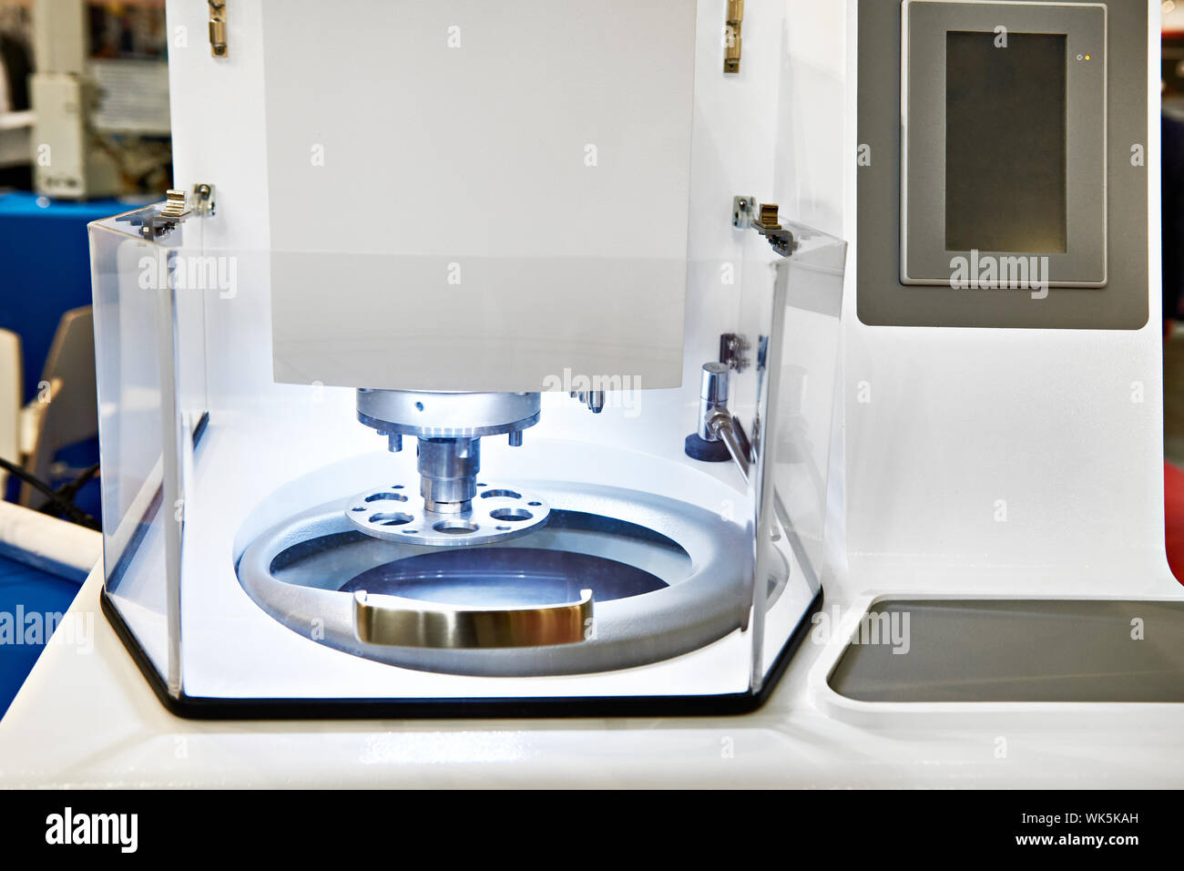 Advanced grinding and polishing system Stock Photo - Alamy