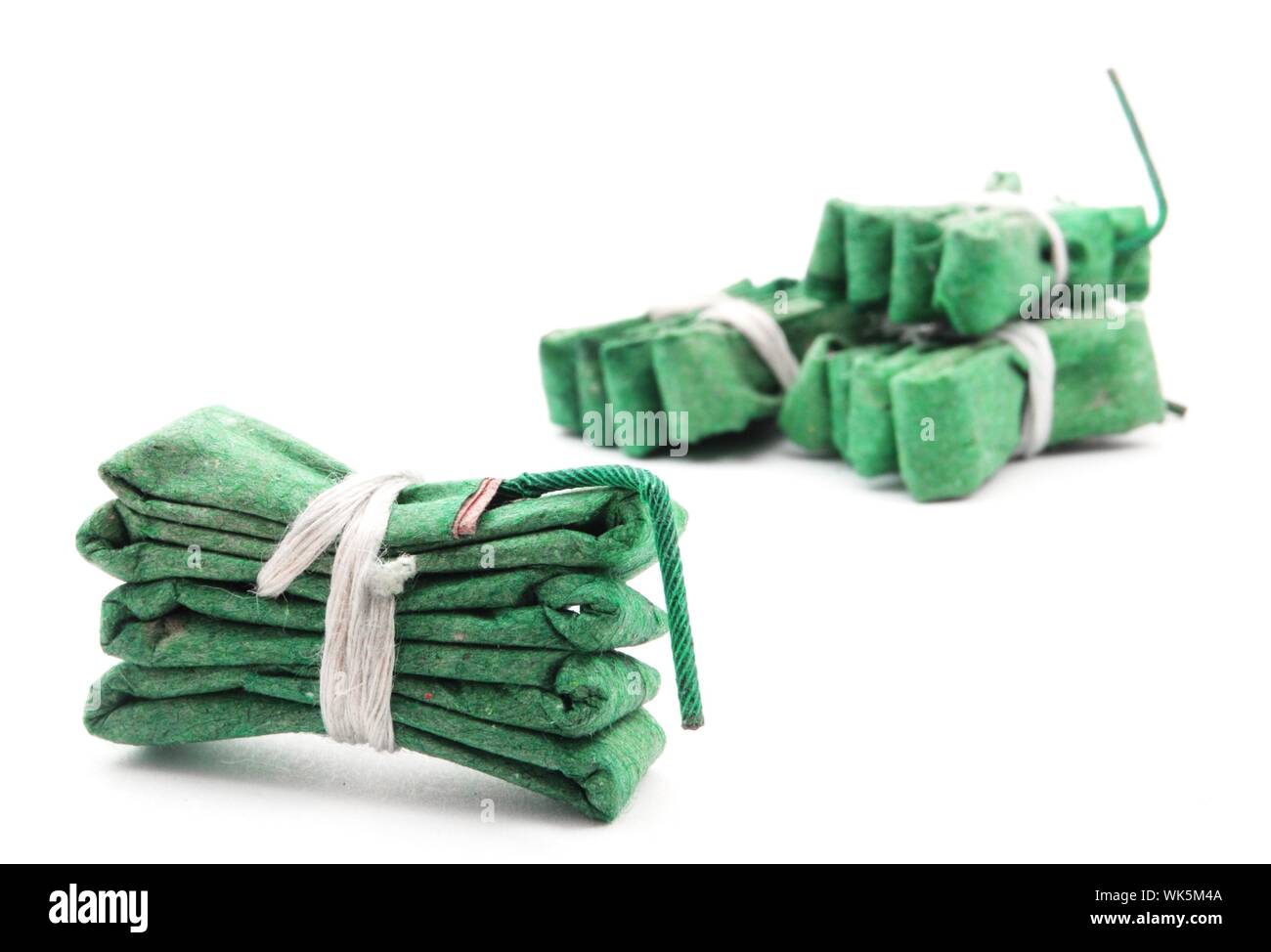 green firecracker isolated on white background showing new year concept ...