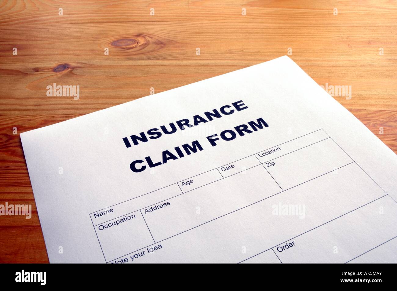 insurance claim for on desk in office showing risk concept Stock Photo ...