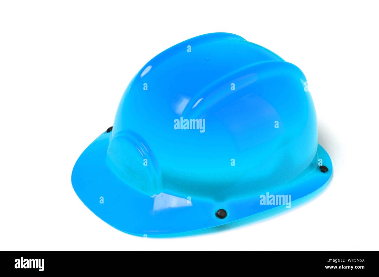 hard hat or construction helmet showing safety work concept Stock Photo ...