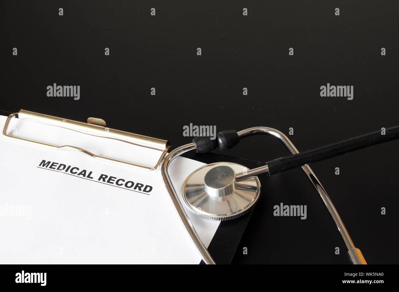 medical record clipboard and stethoscope showing health or medicine ...