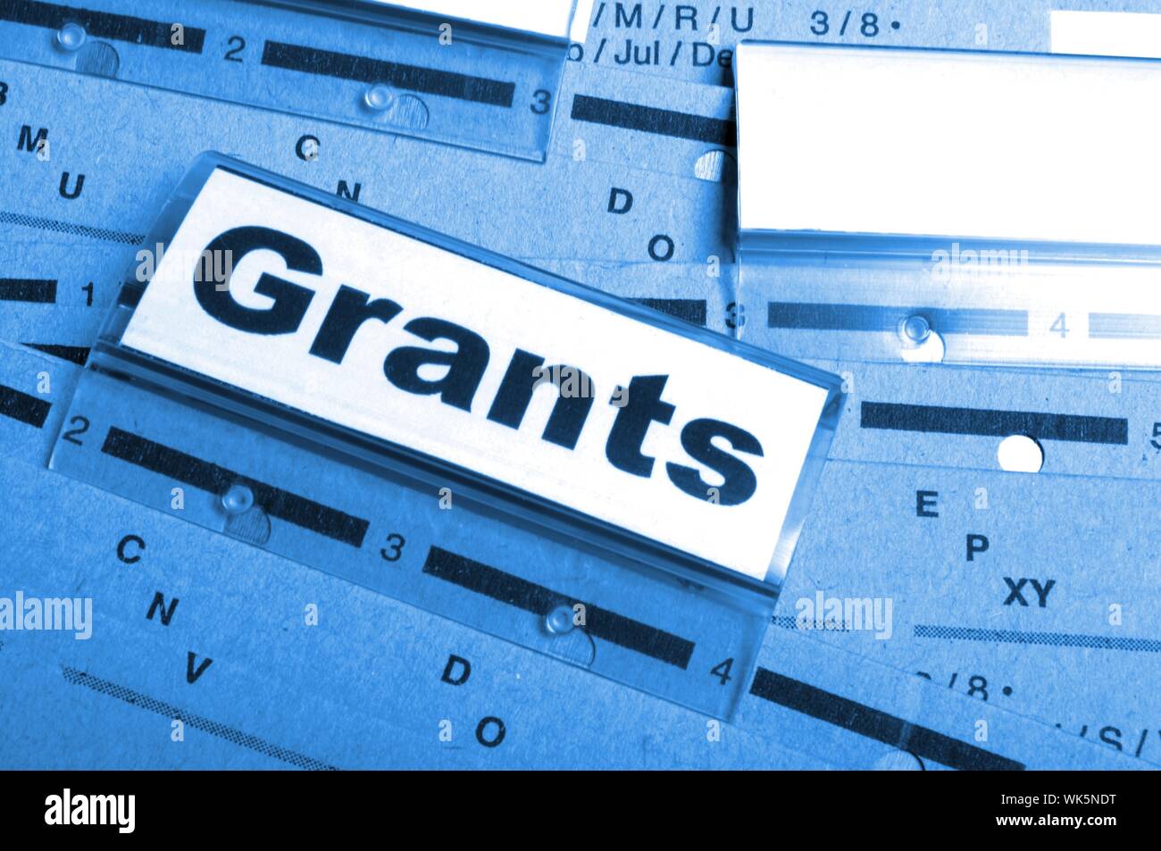 grants word on paper folder showing scholarship or higher education ...