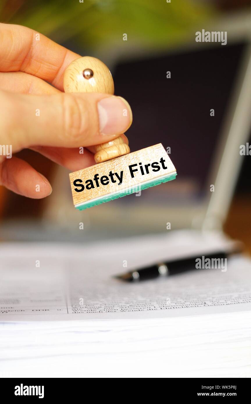 safety first concept with stamp in insurance office Stock Photo - Alamy