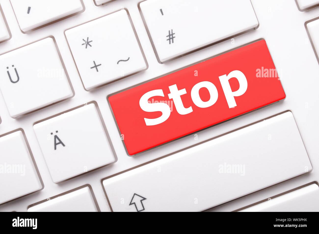 stop key on keyboard in red showing halt concept Stock Photo - Alamy