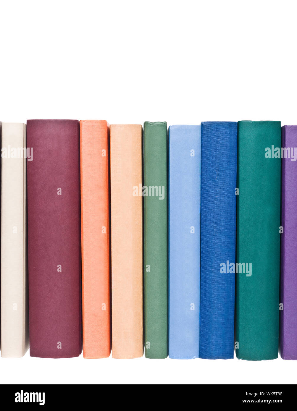 Books in a row isolated on white background Stock Photo - Alamy