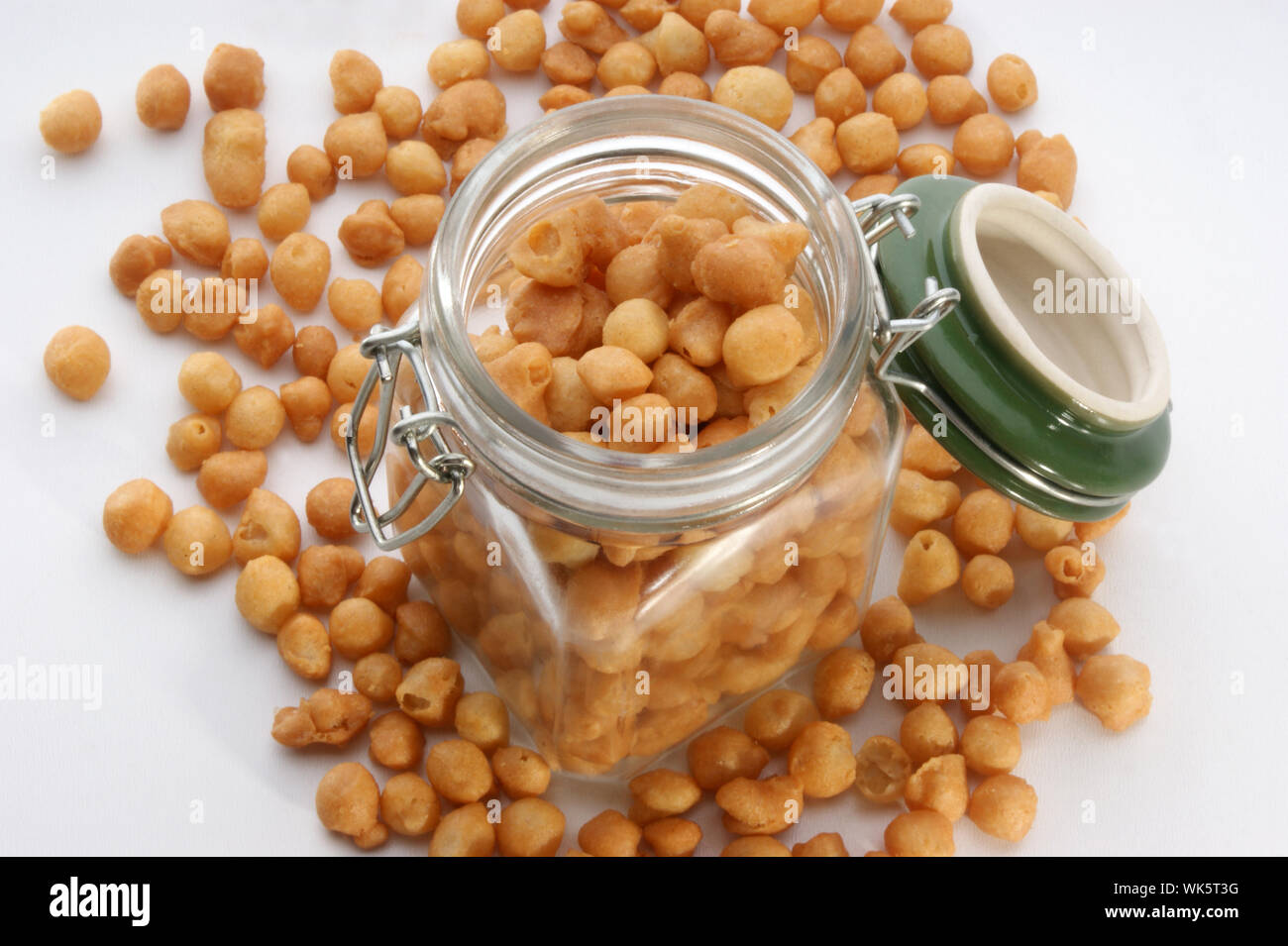 fried batter pearls in a jar and a white background Stock Photo - Alamy