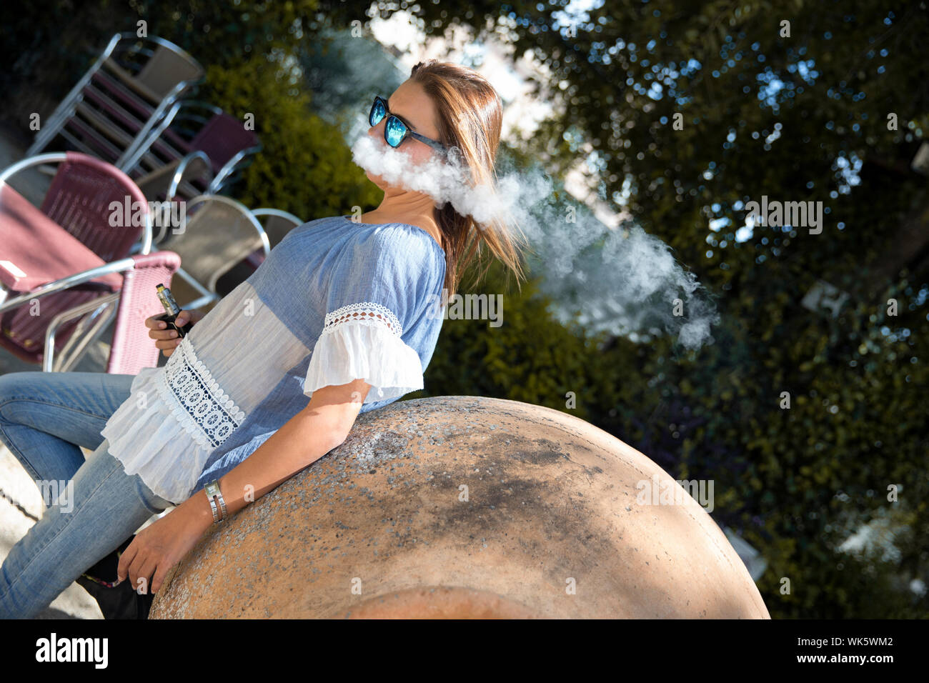 Woman Exhaling Smoke Stock Photos & Woman Exhaling Smoke Stock Images ...