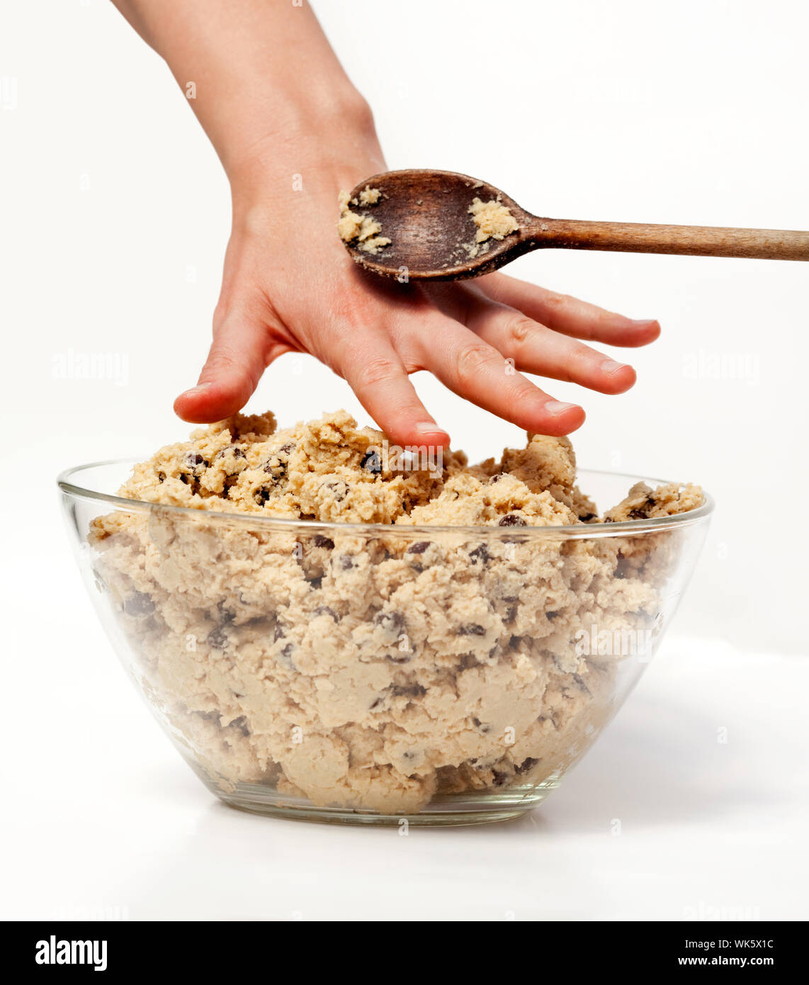 Hand reaching for spoon hi-res stock photography and images - Alamy