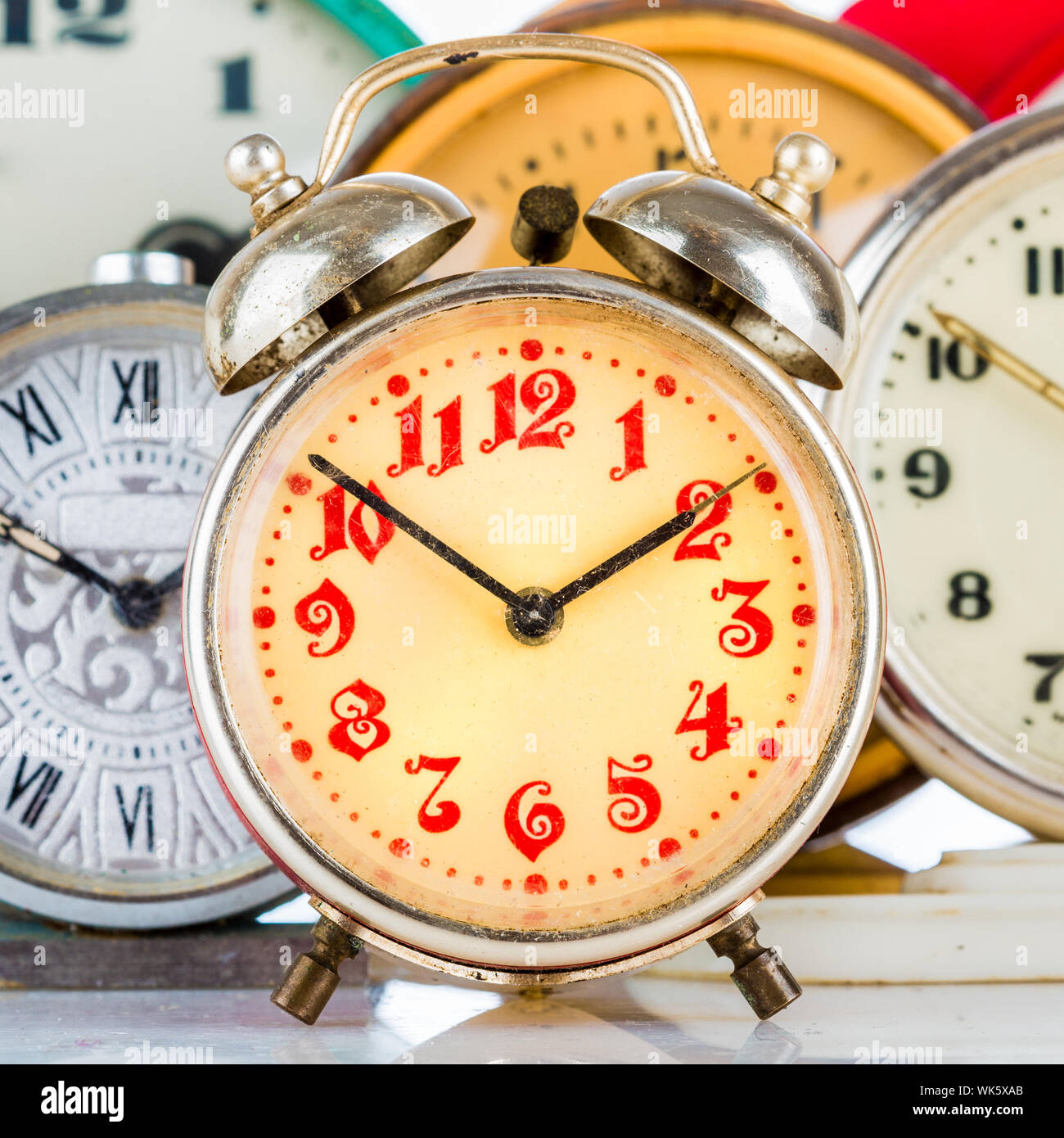 Old clock alarm background Stock Photo - Alamy