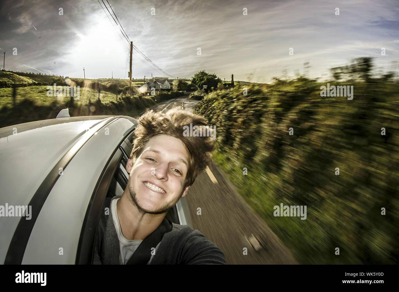 Person smiling while driving hi-res stock photography and images - Alamy