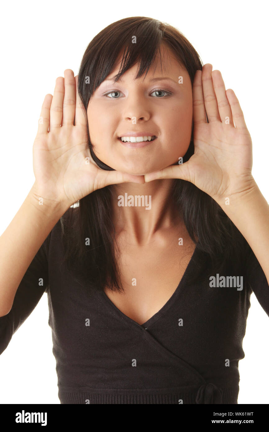 Young woman, framing her face with her hands Stock Photo - Alamy