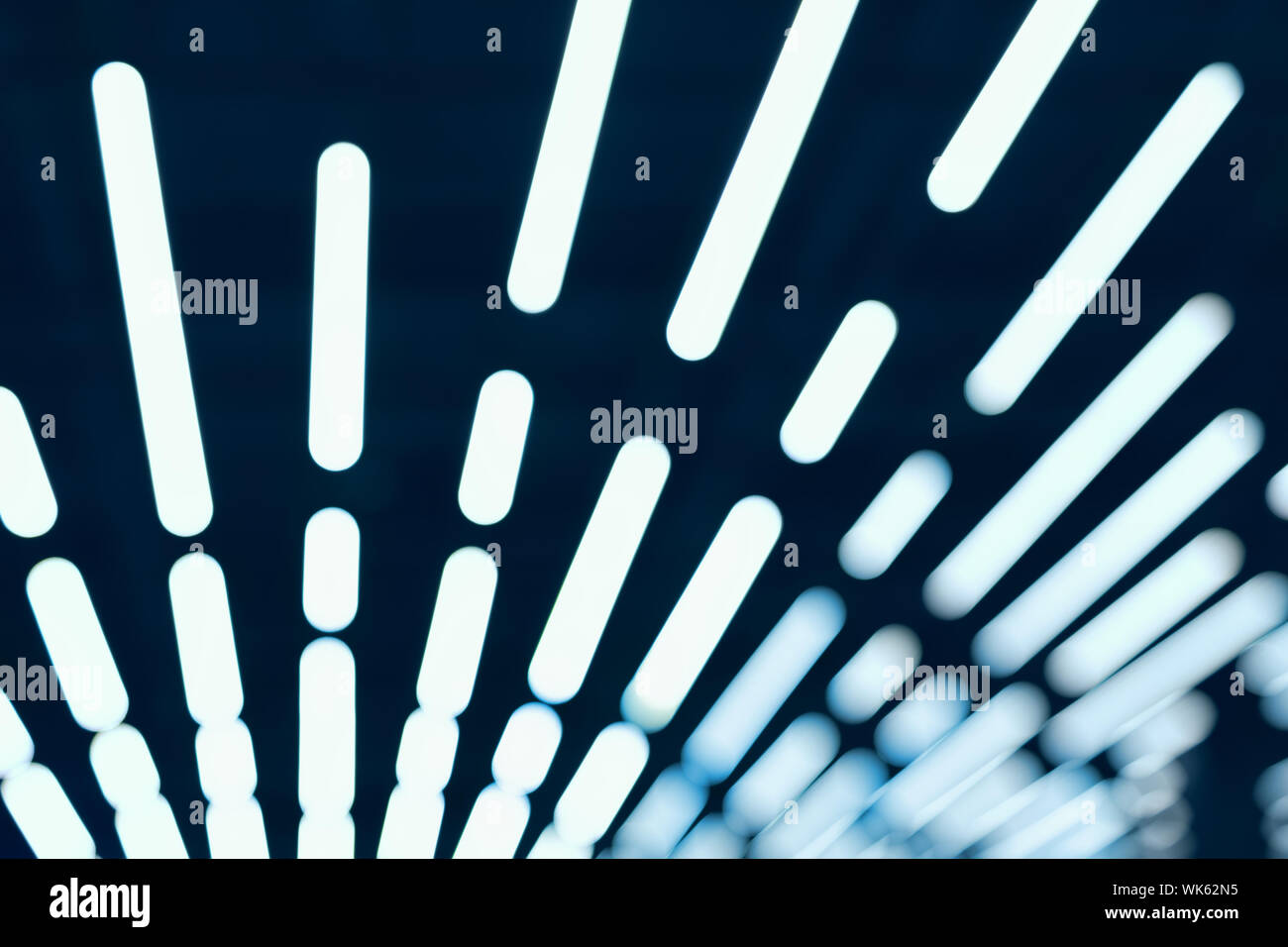 Abstract blurred blue neon led light lamp stripes on ceiling ...