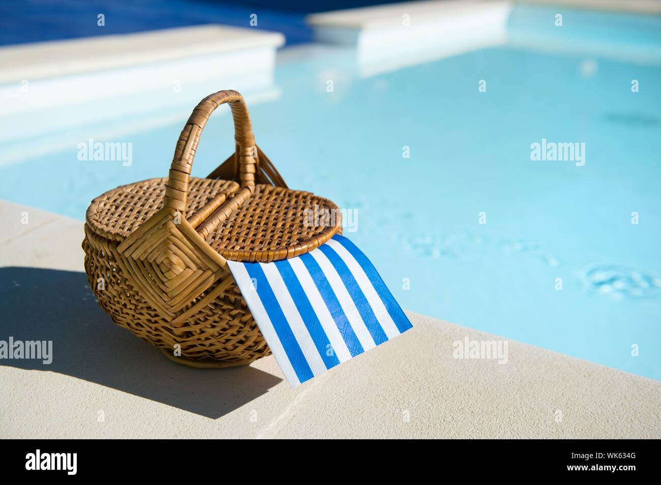 picnic basket at the swimming pool Stock Photo - Alamy