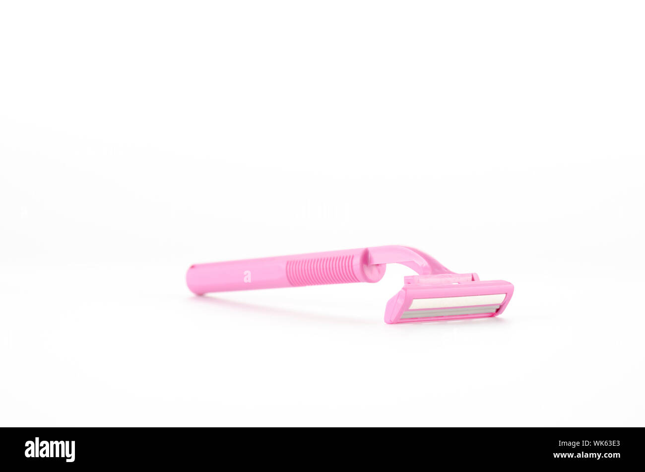 pink disposable shaving on a white background Stock Photo - Alamy