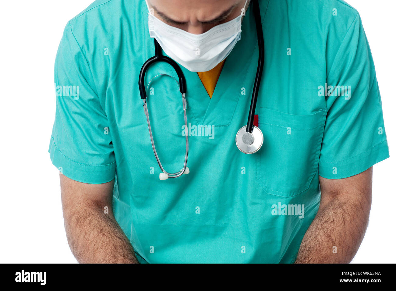 Doctor's face covered with a surgical mask Stock Photo - Alamy
