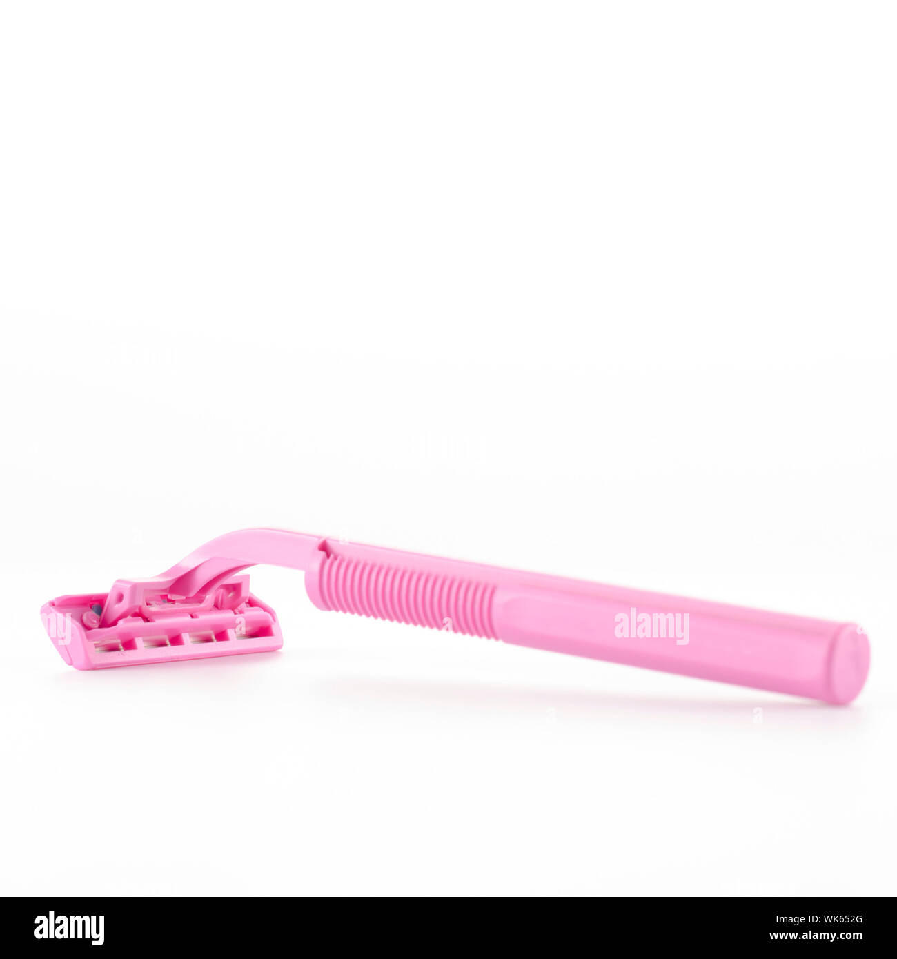 pink disposable shaving on a white background Stock Photo - Alamy