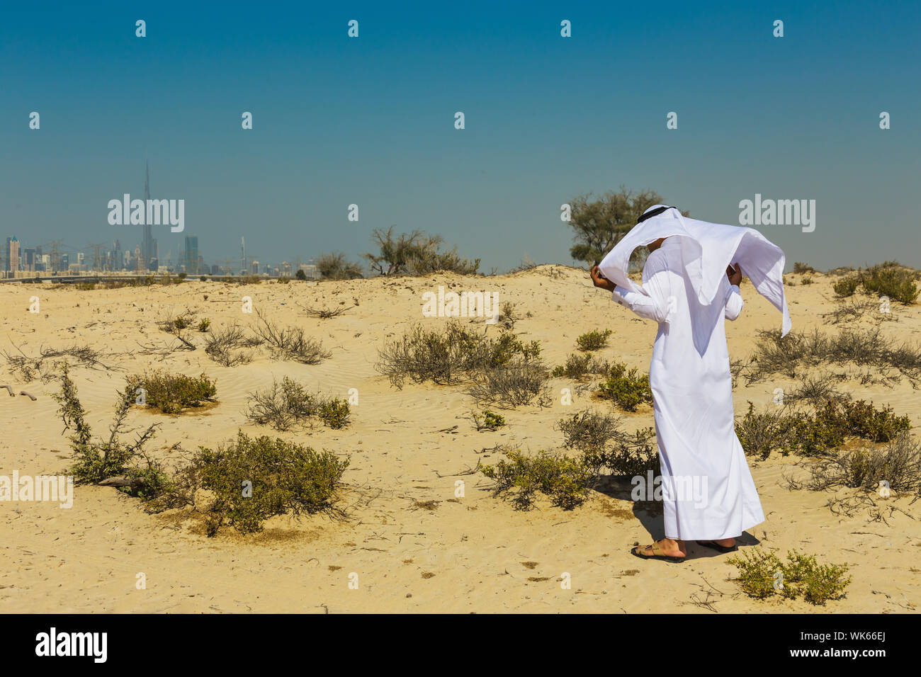 Arab in the Arabian desert on a hot sunny day Stock Photo - Alamy