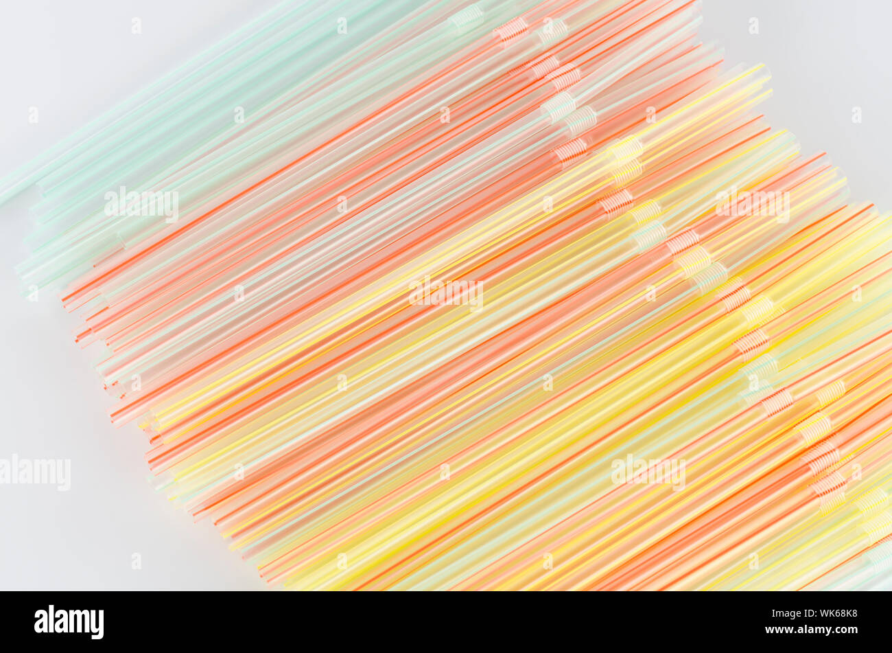 coloful straw on a white background Stock Photo - Alamy