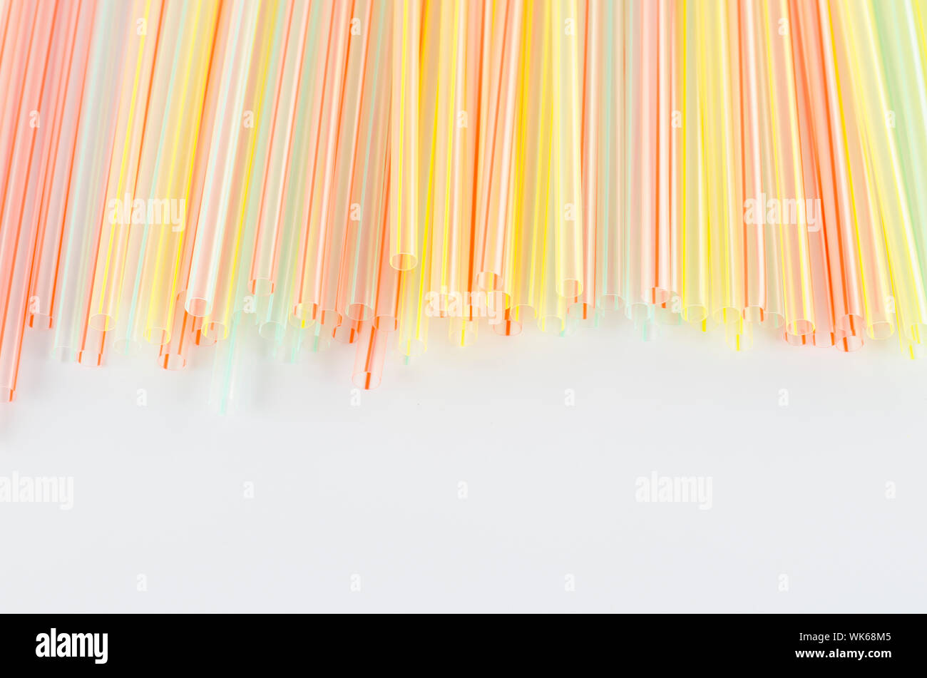 coloful straw on a white background Stock Photo - Alamy