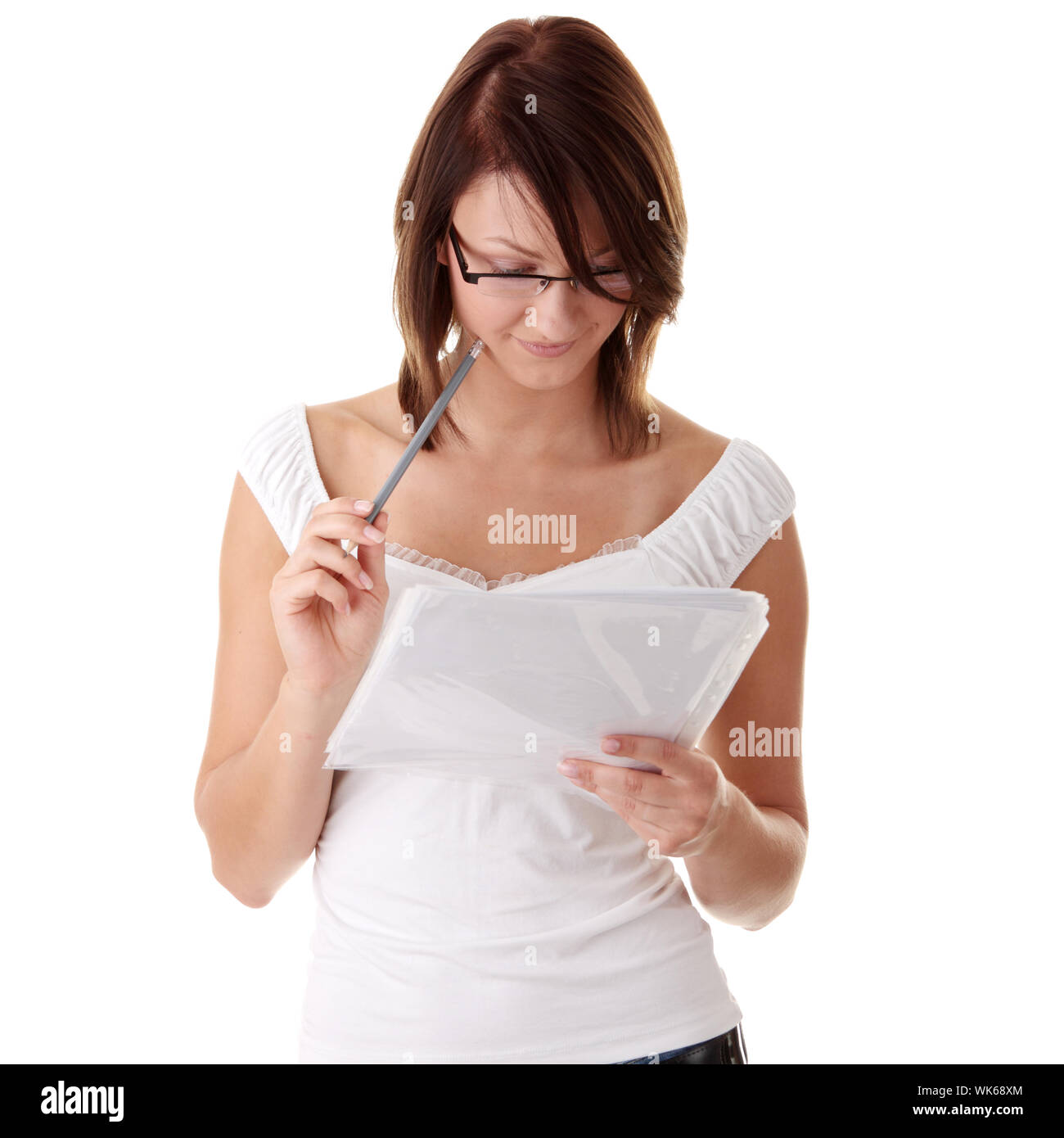 Young beautiful woman (student) learning, isolated on white background ...