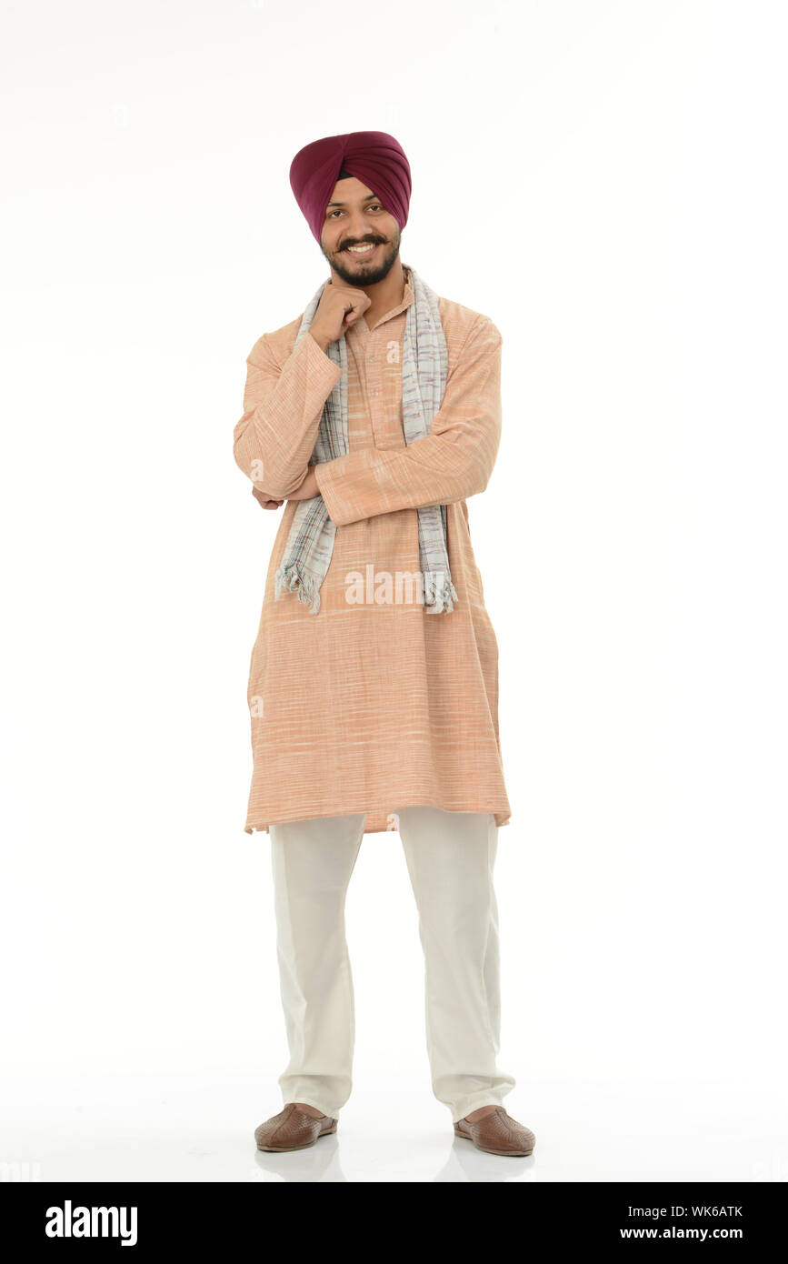 Rural man standing and smiling Stock Photo - Alamy