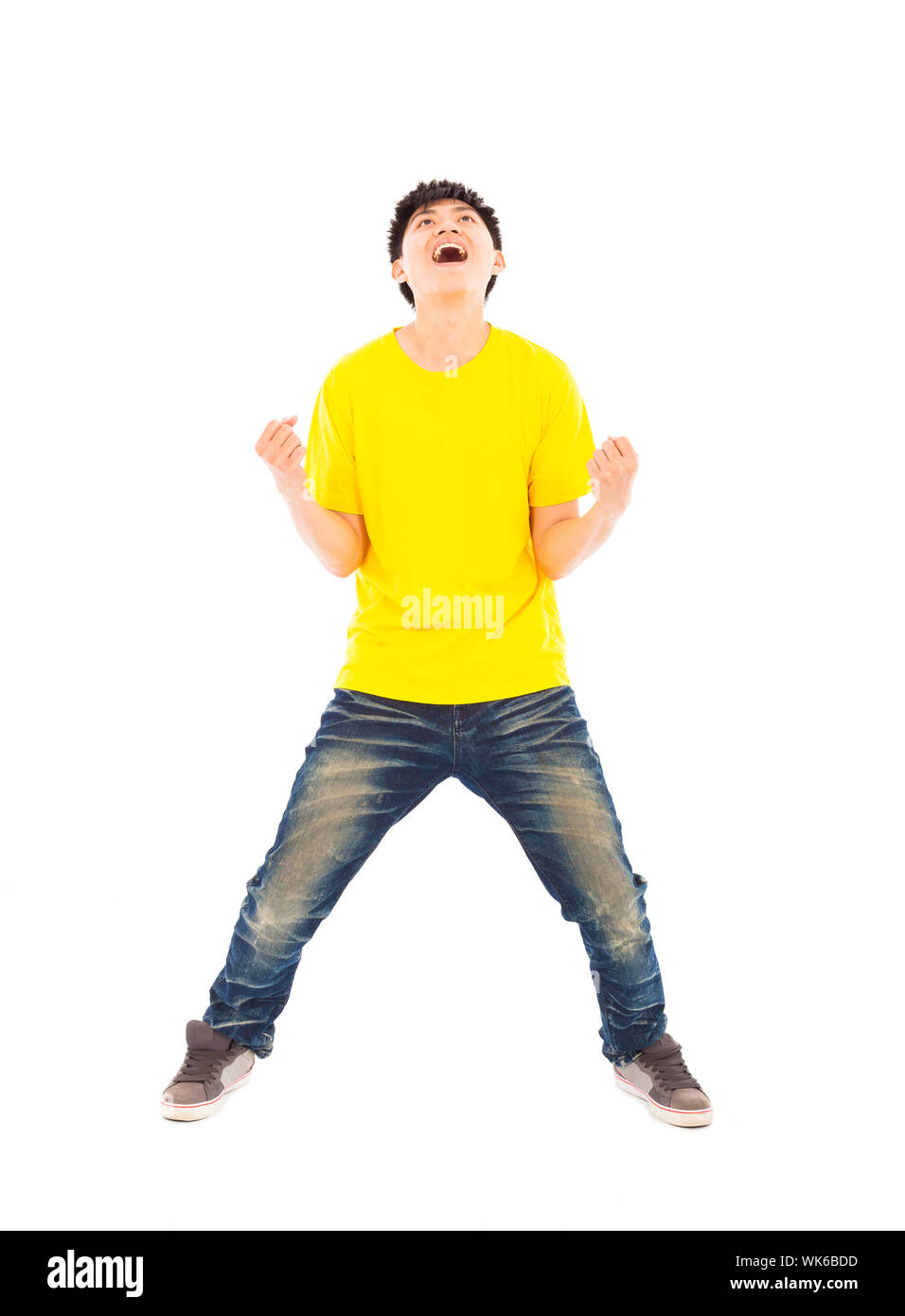 young man making a exaggerate expression and pose Stock Photo - Alamy