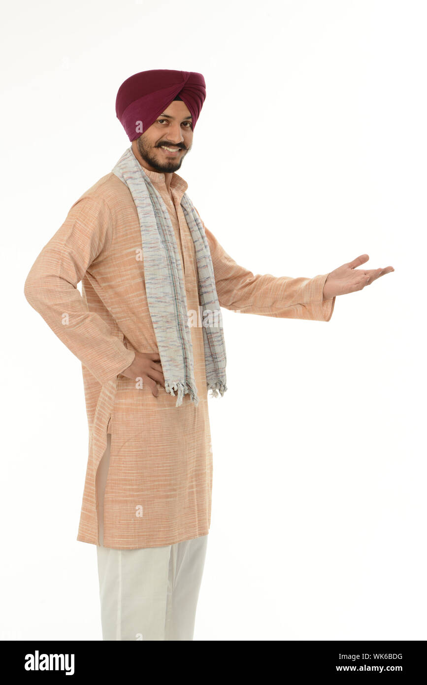 Rural man standing with his arm outstretched Stock Photo - Alamy