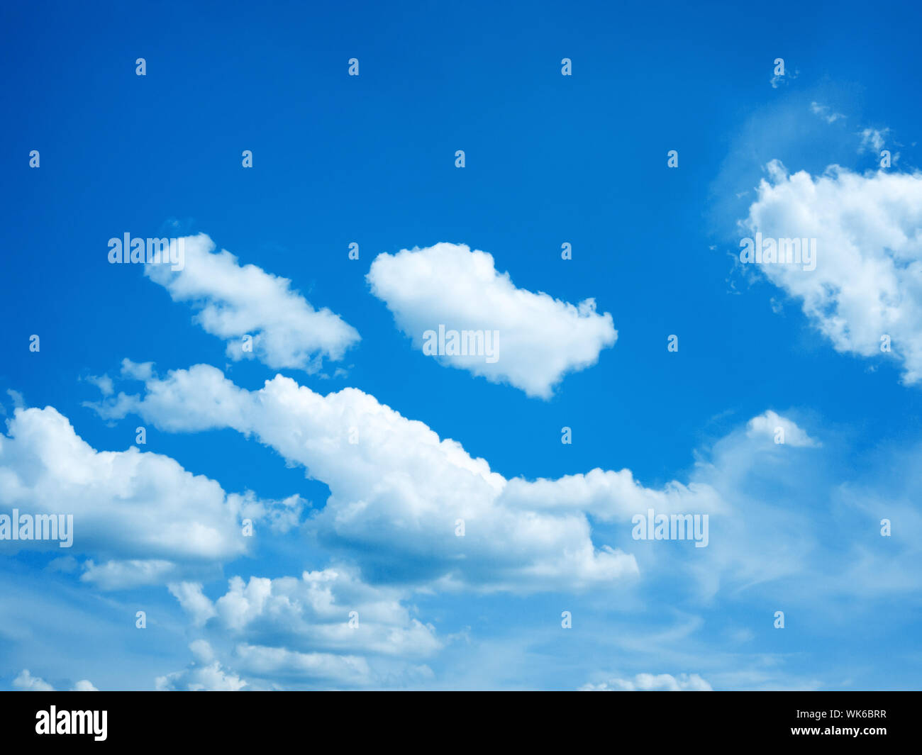 An image of a bright blue sky background Stock Photo - Alamy
