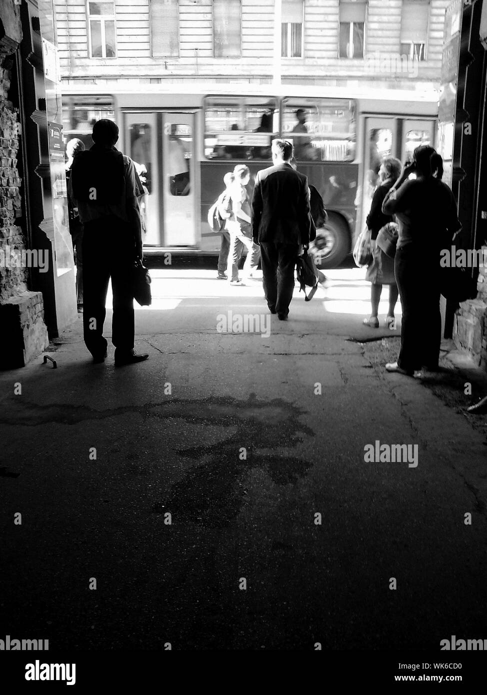 Bus stop people standing hi-res stock photography and images - Alamy