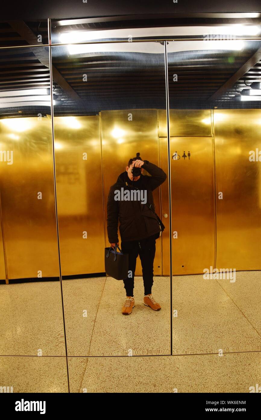Gold reflection man hi-res stock photography and images - Alamy